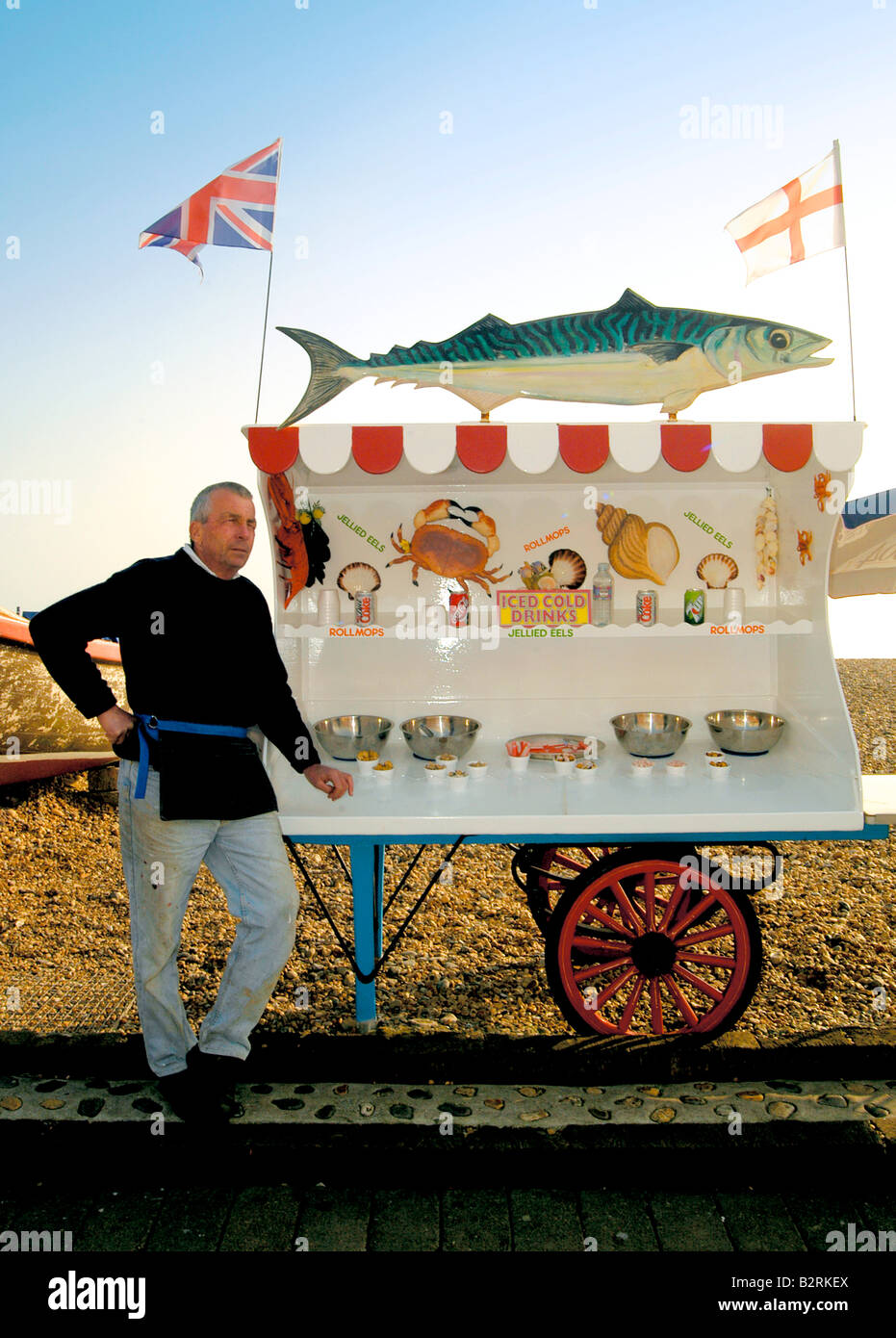 fishmonger with stall Stock Photo - Alamy