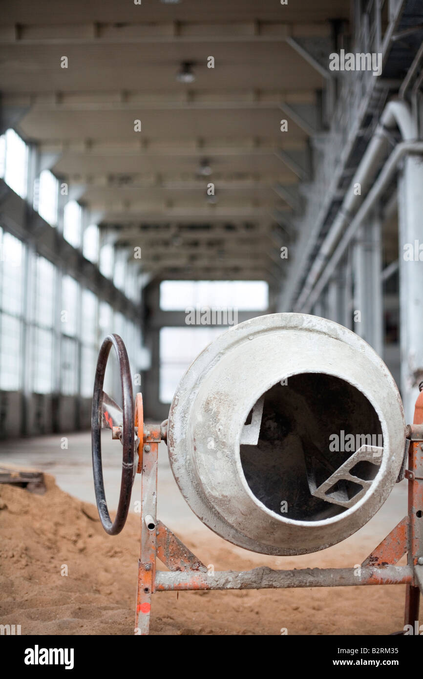 Cement mixer in spacious building Stock Photo - Alamy