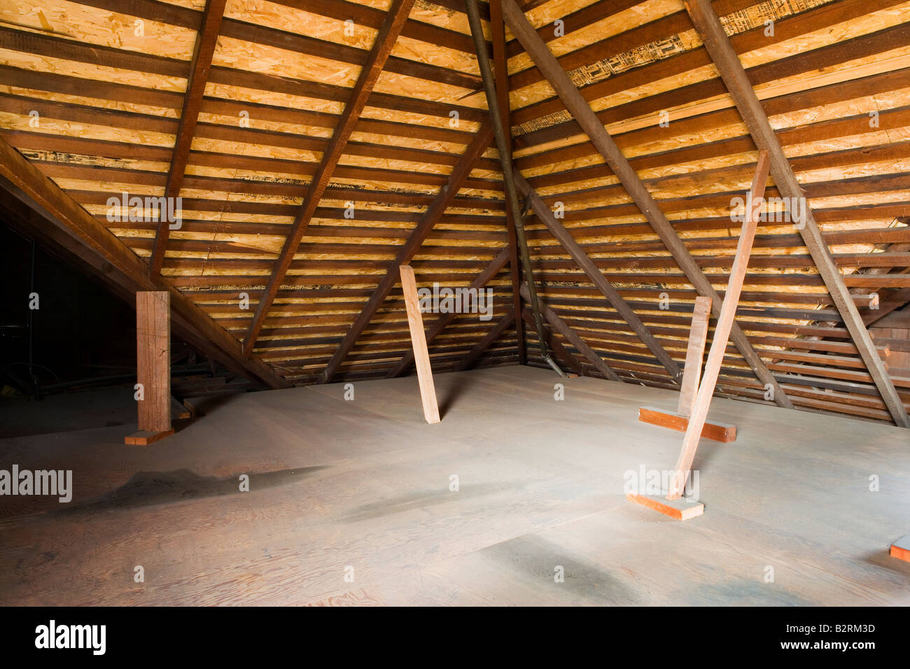 Large unfinished attic Stock Photo - Alamy