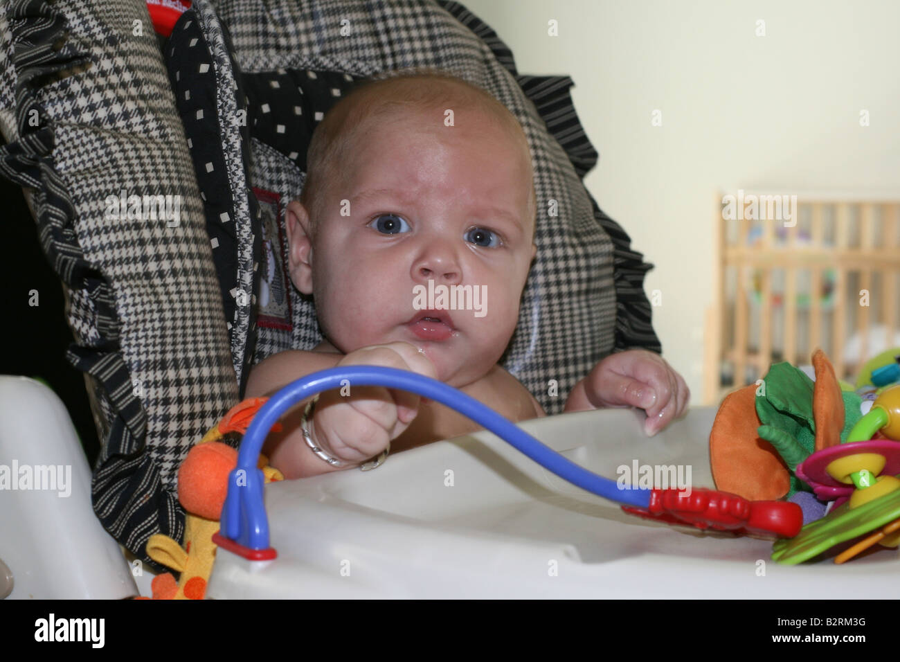 Baby looking scared hi-res stock photography and images - Alamy