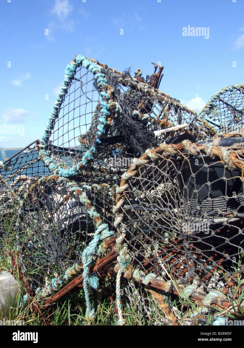 Used lobster traps hi-res stock photography and images - Alamy