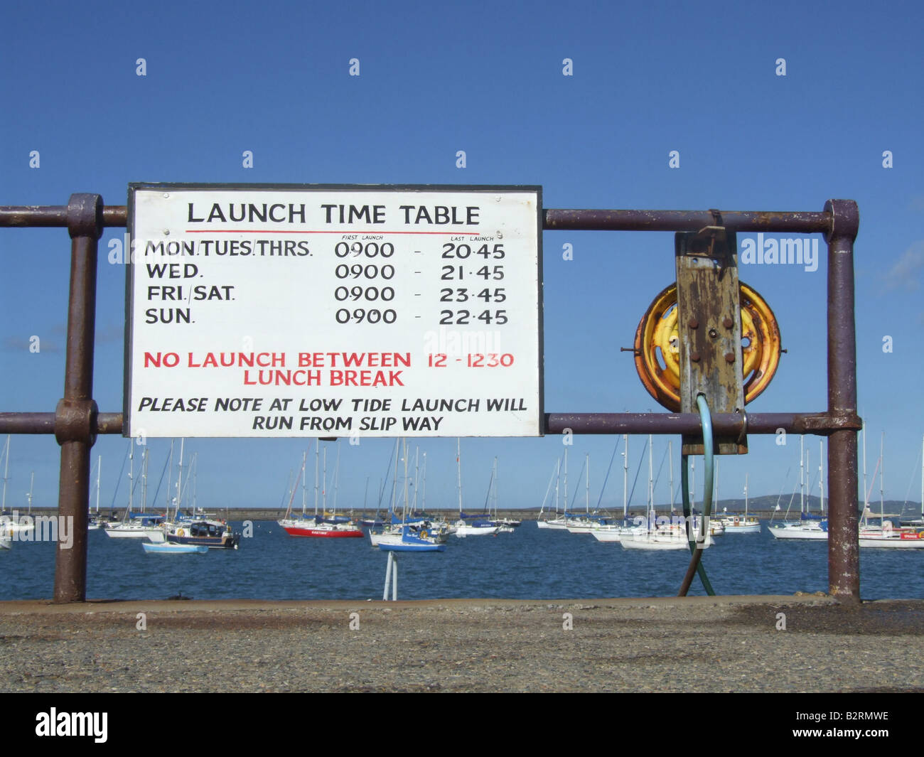boat launch timetable at holyhead harbour, north wales Stock Photo - Alamy