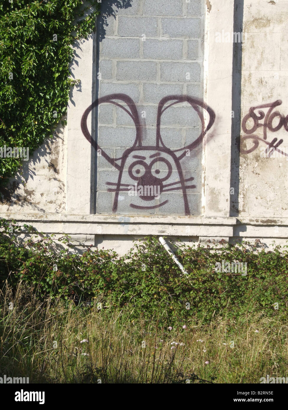 Sad face graffiti on wall hi-res stock photography and images - Alamy