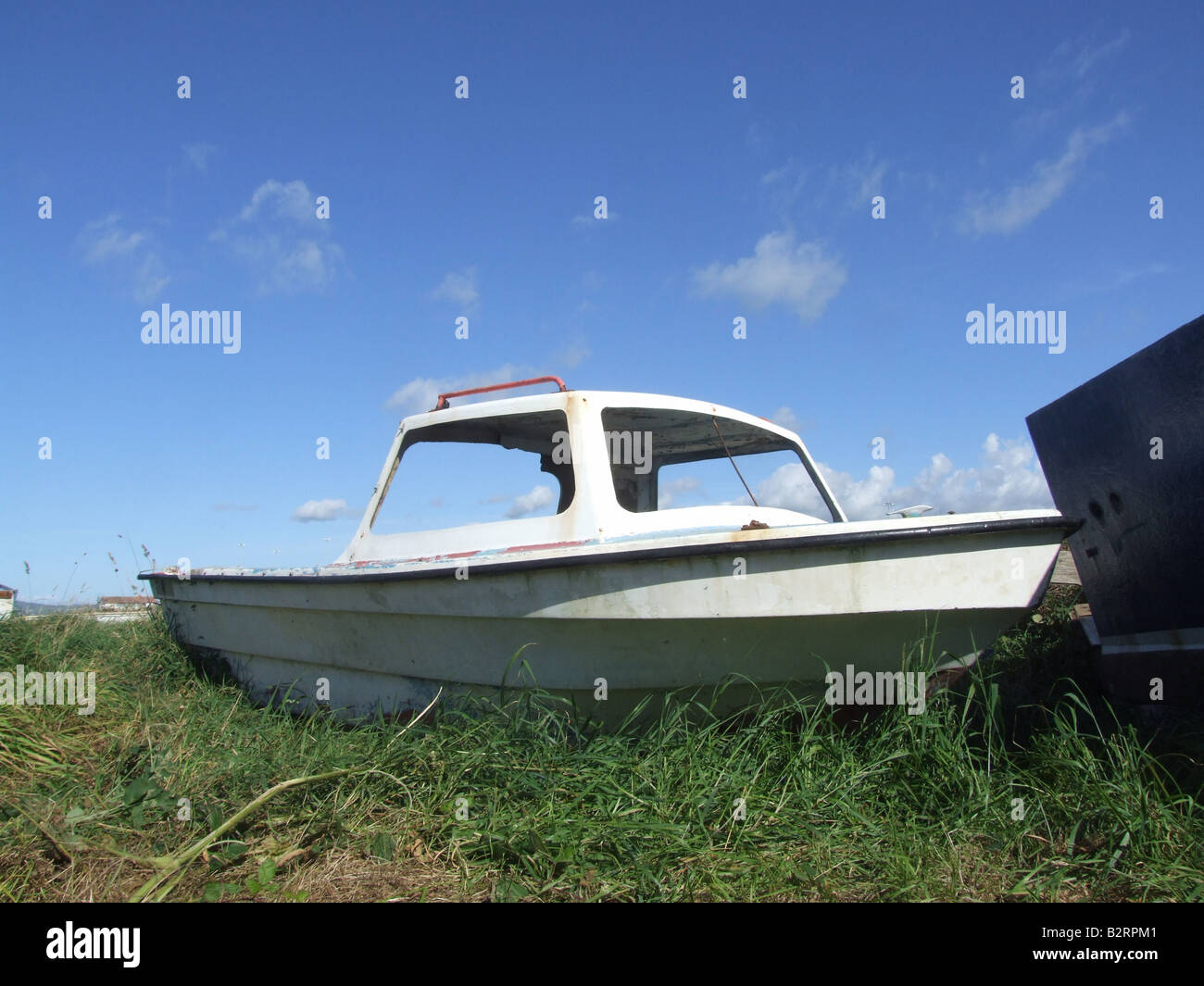 old boat left on dry land Stock Photo - Alamy