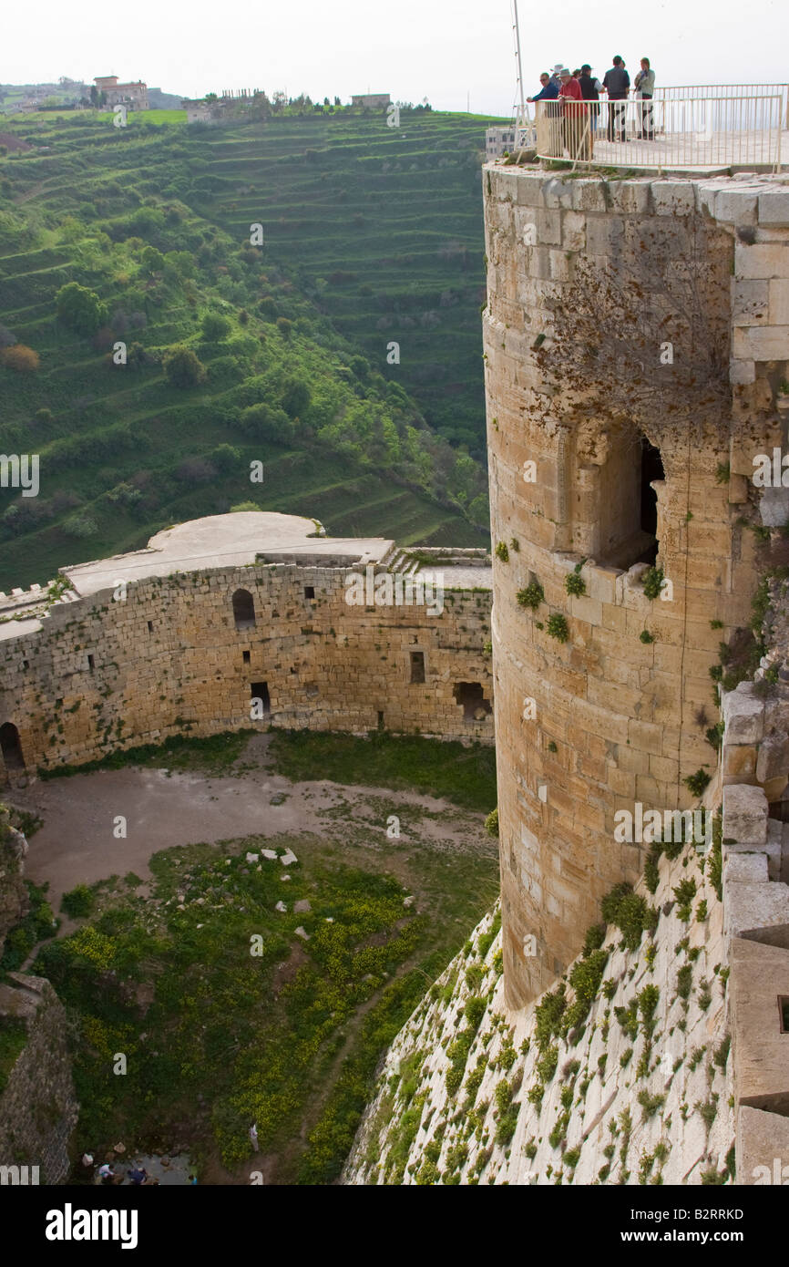 Tourists on top of Krak Des Chevaliers Crusader Castle in Syria Stock ...