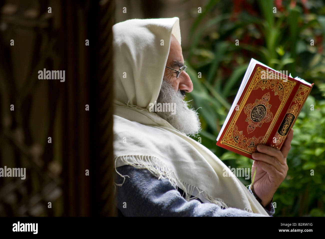 Muslim man reading quran in the mosque hi-res stock photography and ...