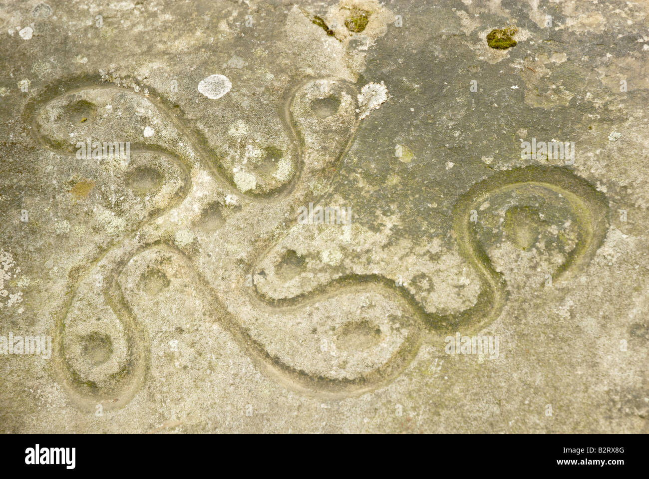The Swastika Stone on Ilkley Moor, West Yorkshire. This carving is a ...