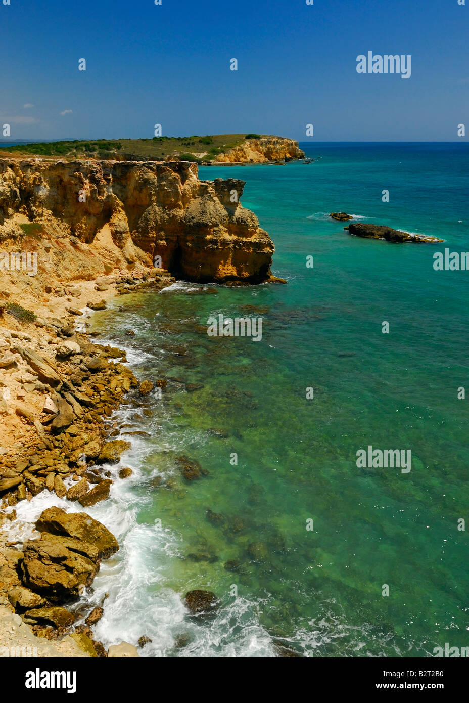 The rough cliffs and shoreline at the Los Morrillos Lighthouse located ...