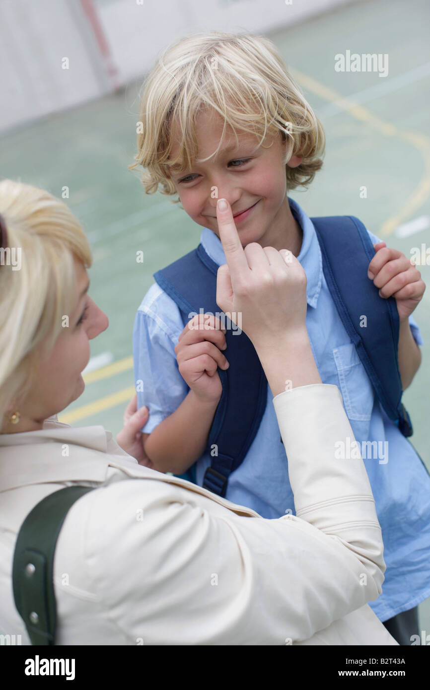 Mother sending son off to school Stock Photo - Alamy