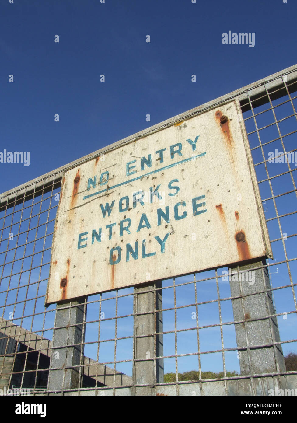 no entry works entrance only sign on factory gate Stock Photo - Alamy