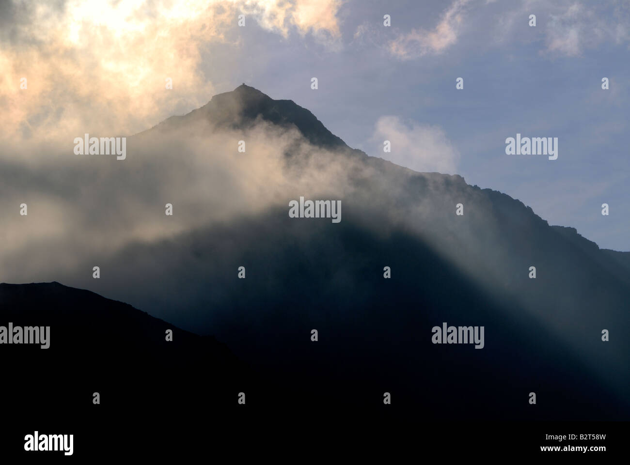 Mount Snowdon in atmospheric clouds Stock Photo - Alamy
