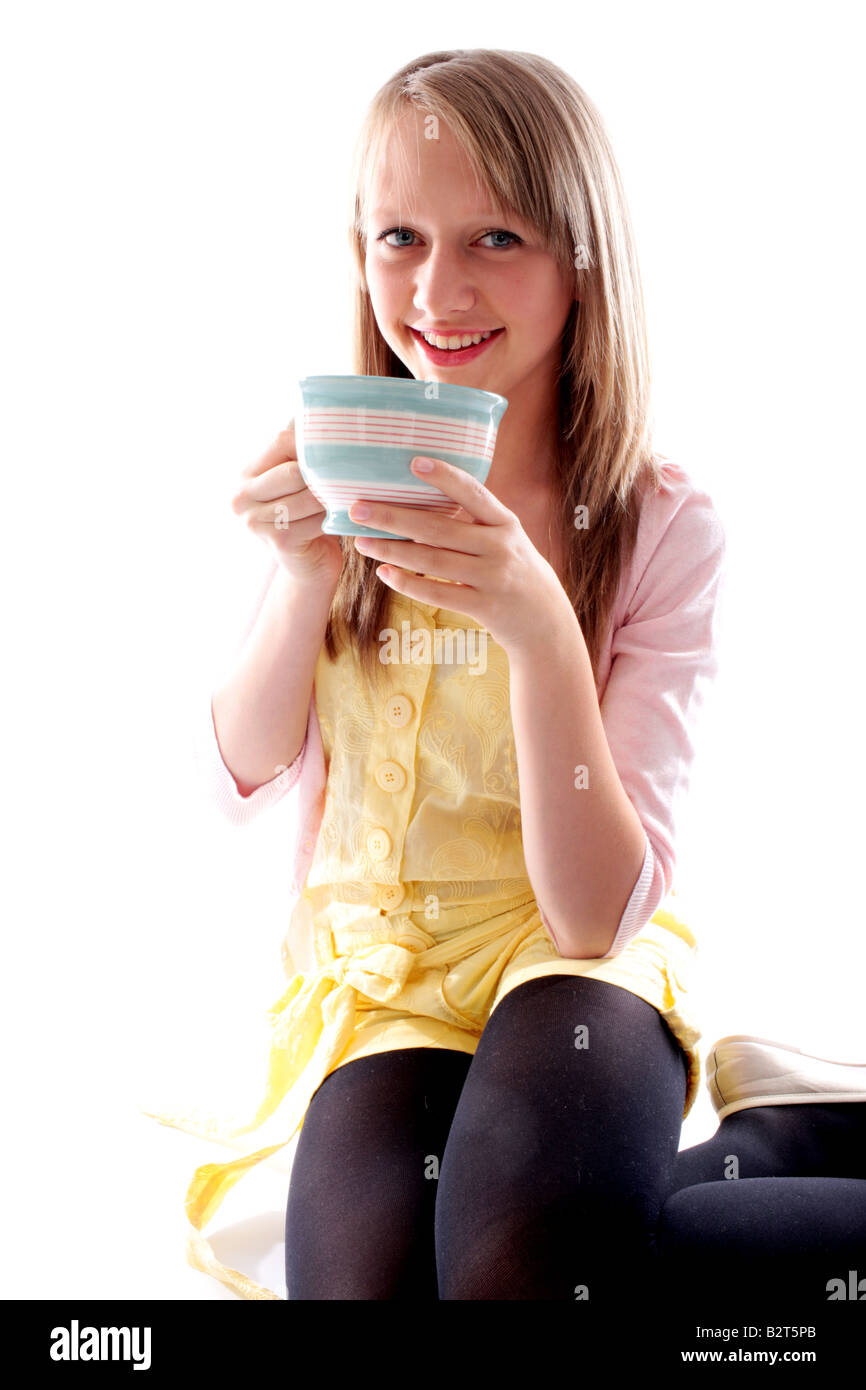 Teenage Girl Holding Cup of Tea Model Released Stock Photo - Alamy