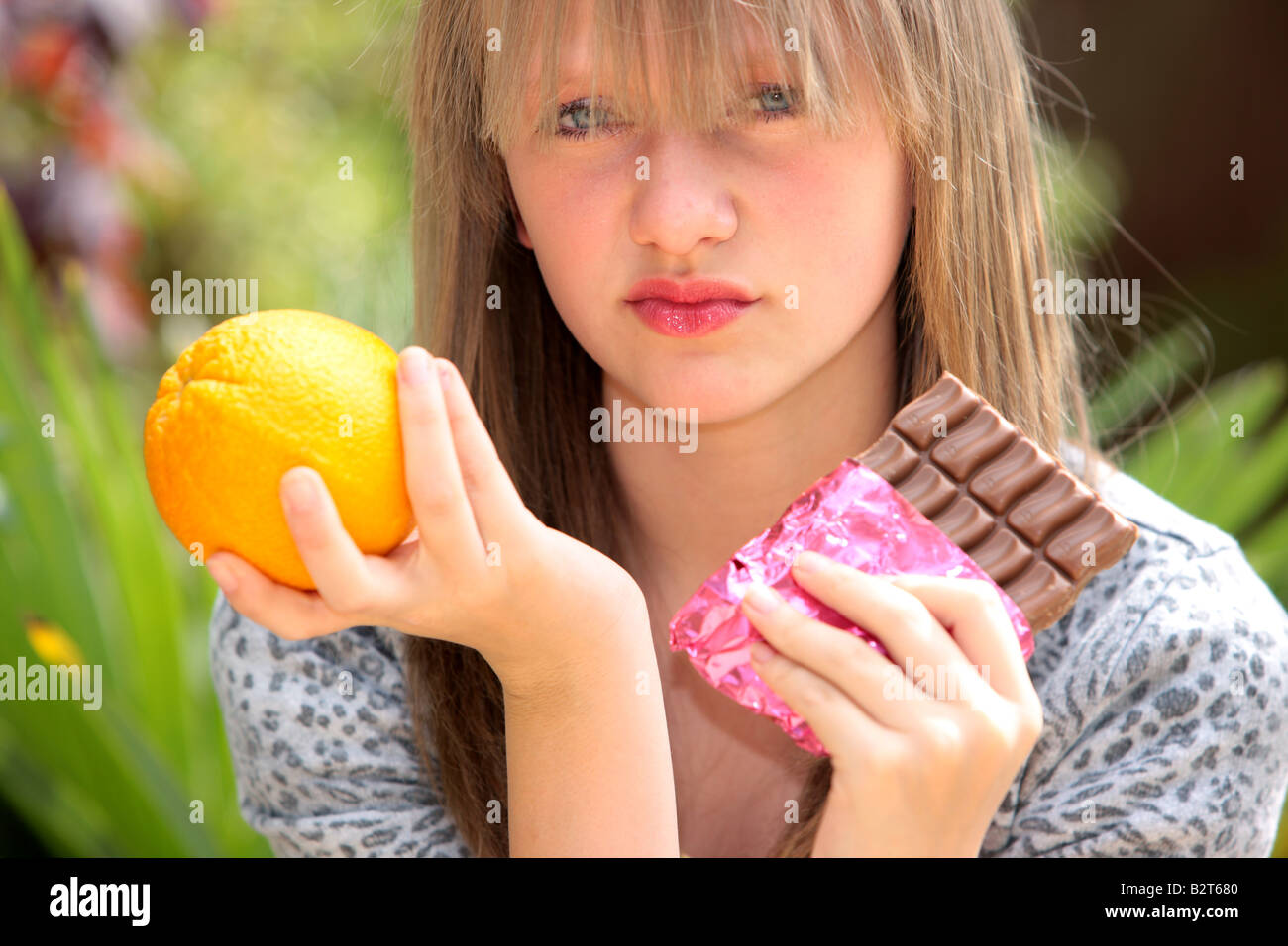 Teenage girl choosing food model hi-res stock photography and images ...