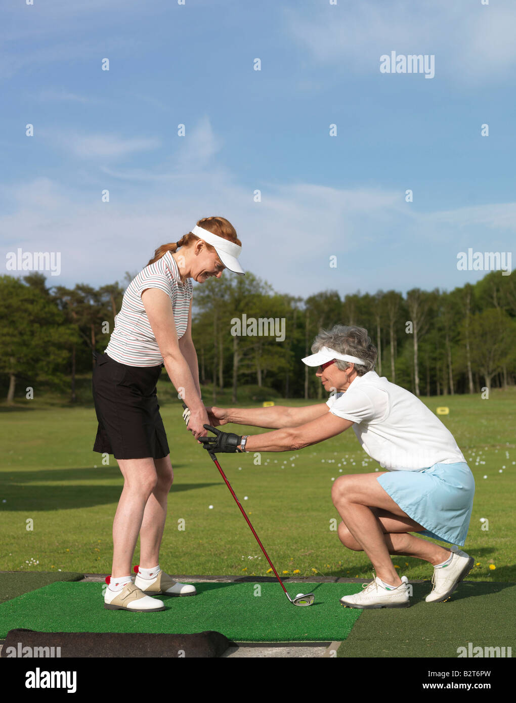 Female golfer driving golf ball High Resolution Stock Photography and ...