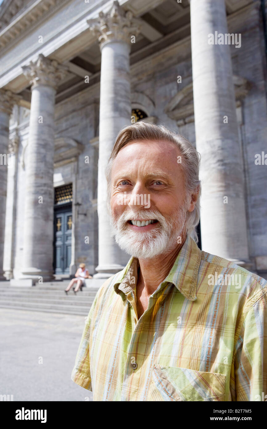 Man in front of church building hi-res stock photography and images - Alamy