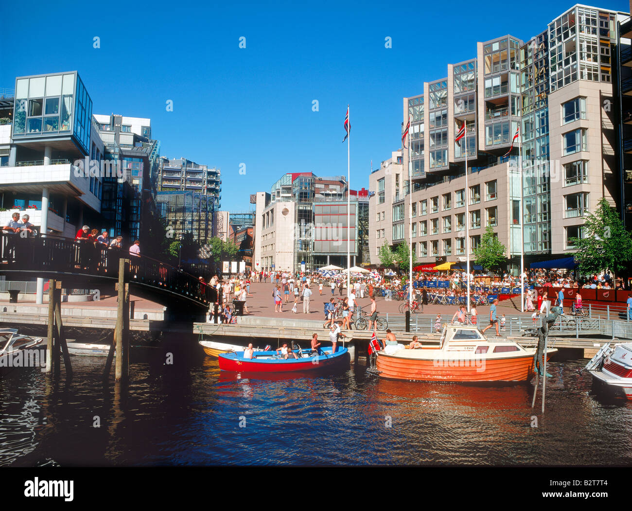 Seaside restaurants and boats at Aker Pier in Oslo Stock Photo - Alamy
