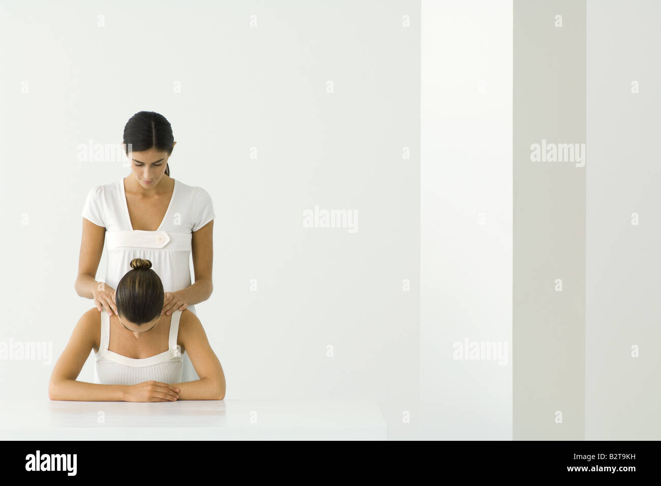 Woman receiving shoulder massage Stock Photo - Alamy