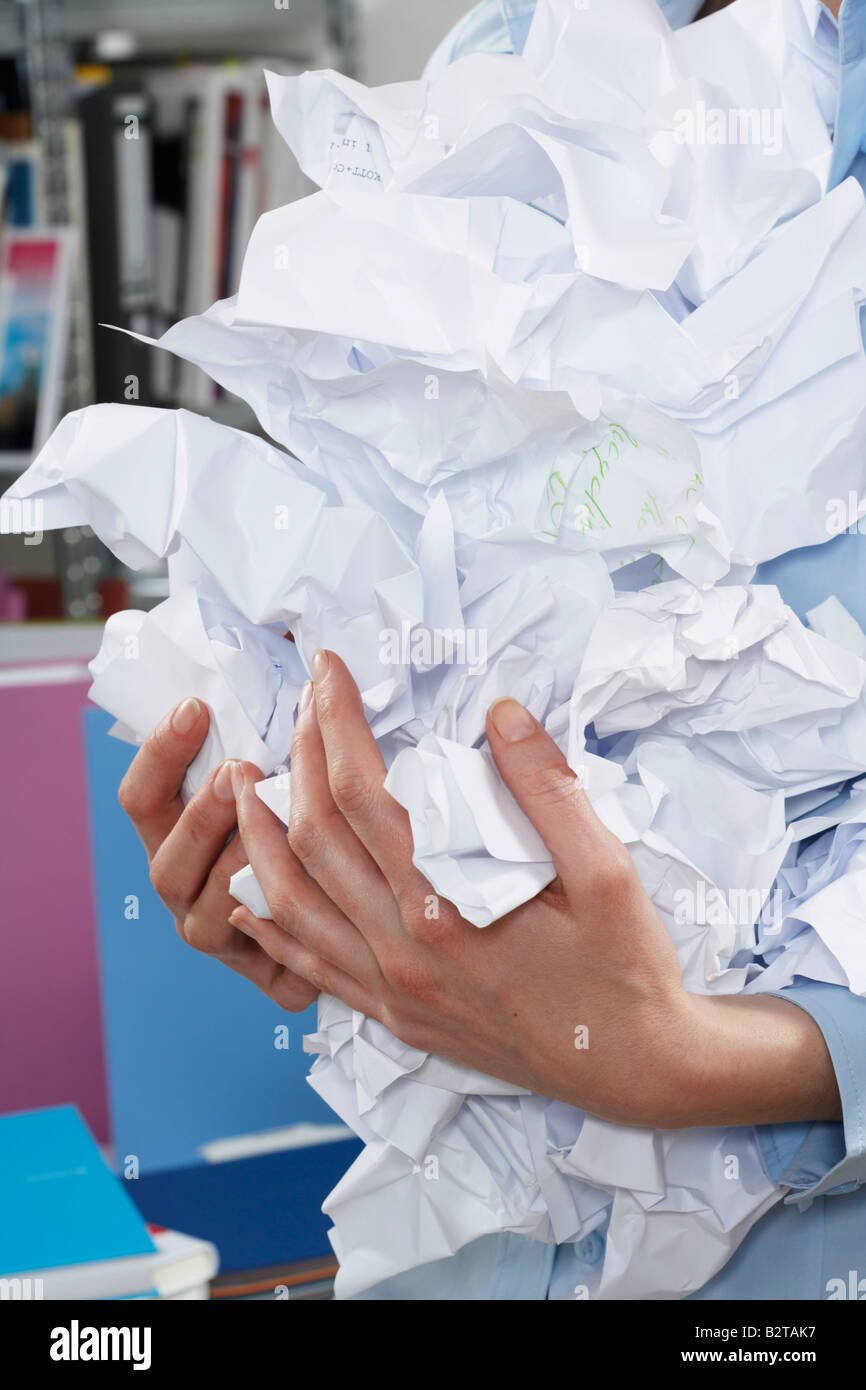 Woman crumpling paper hi-res stock photography and images - Alamy