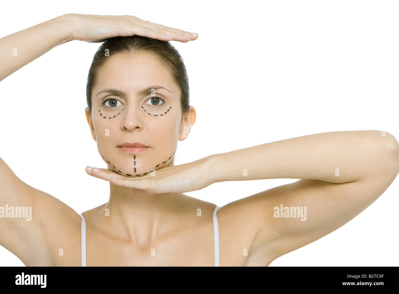 Woman eyes up finger on chin hi-res stock photography and images - Alamy