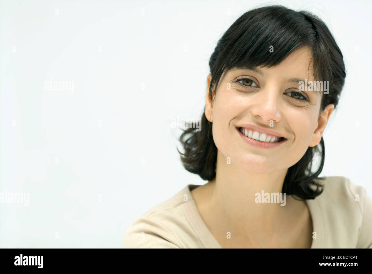 Woman smiling at camera, portrait Stock Photo - Alamy