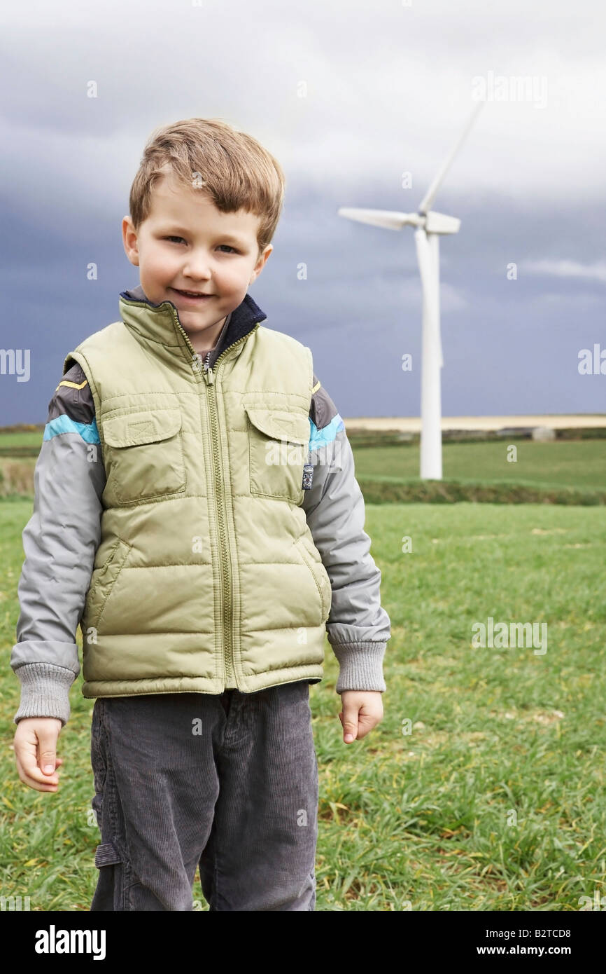 Boy on a wind farm Stock Photo - Alamy
