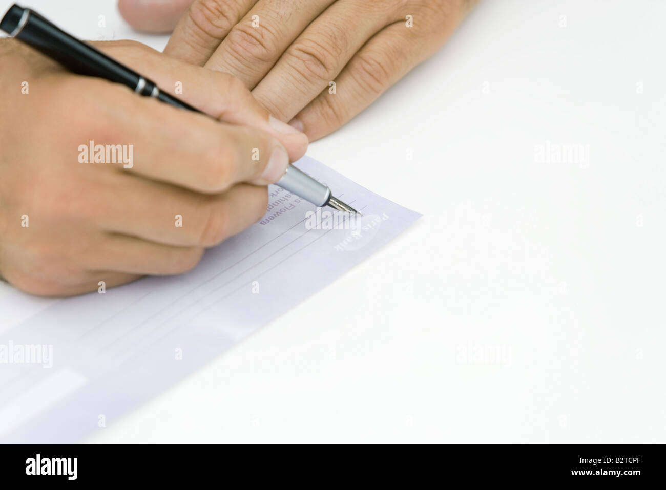 Signing cheques hi-res stock photography and images - Alamy