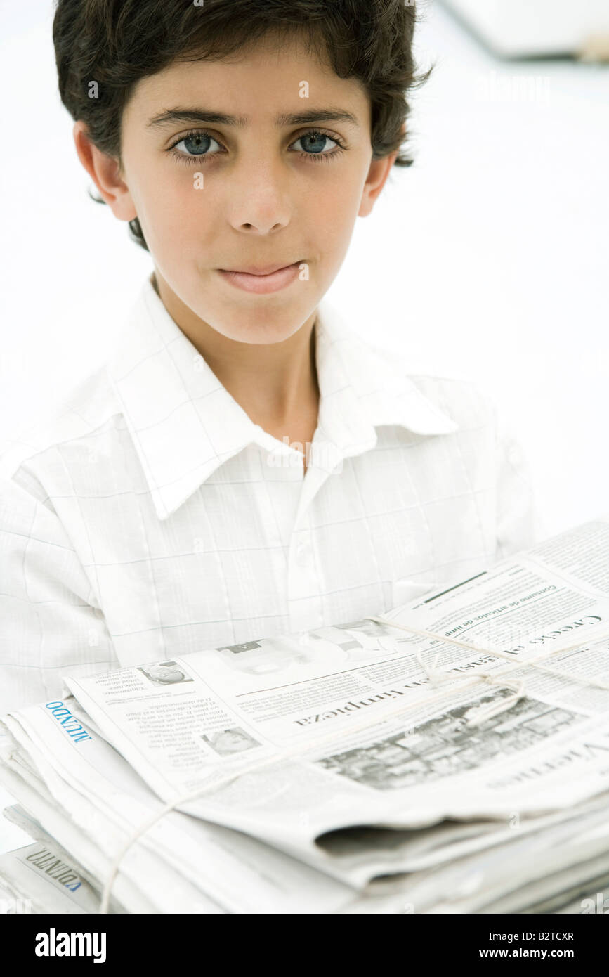 Boy delivering newspapers hi-res stock photography and images - Alamy