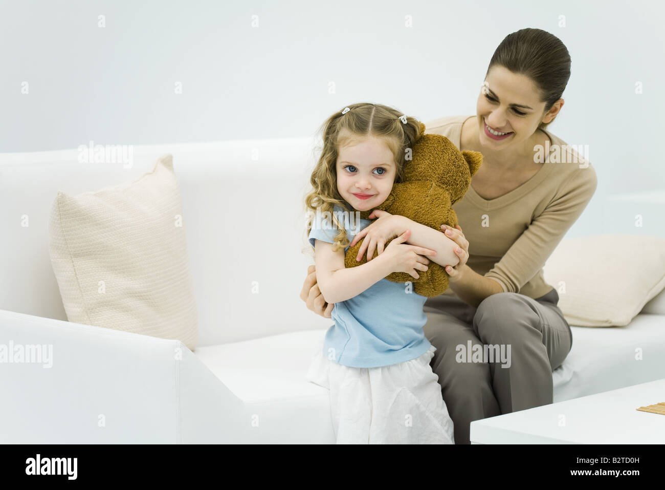 Girls holding stuffed animals on hi-res stock photography and images ...