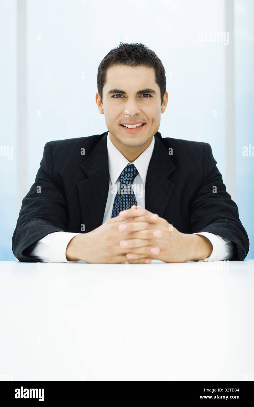 Man smiling hands clasping hi-res stock photography and images - Alamy