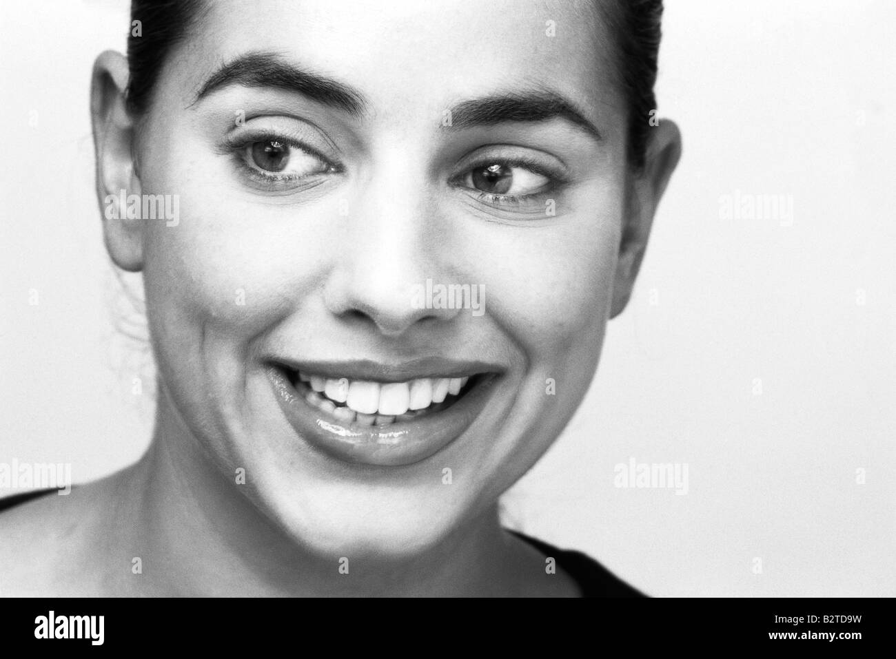 Young woman smiling, portrait Stock Photo - Alamy