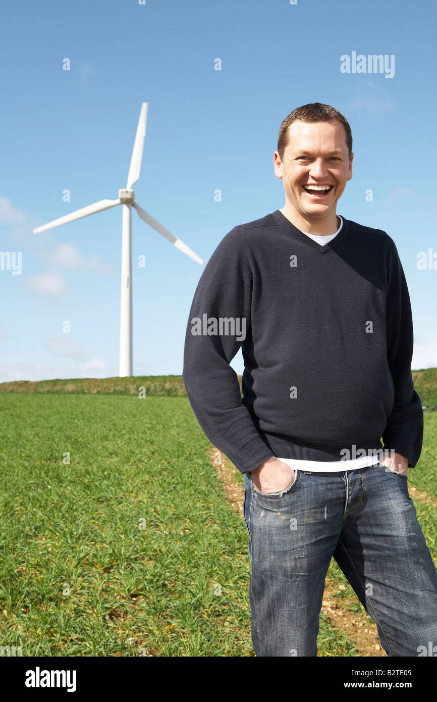 Man smiling on a wind farm Stock Photo - Alamy