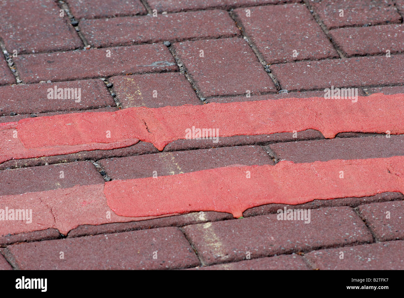 Red Route double red lines on road UK Stock Photo - Alamy
