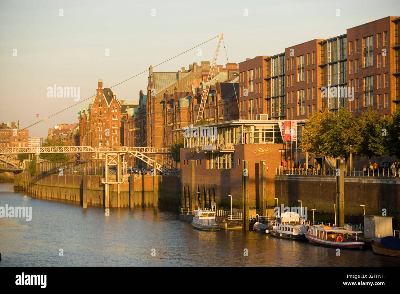 View at a row of brick-lined buildings of the Speicherstadt in the ...