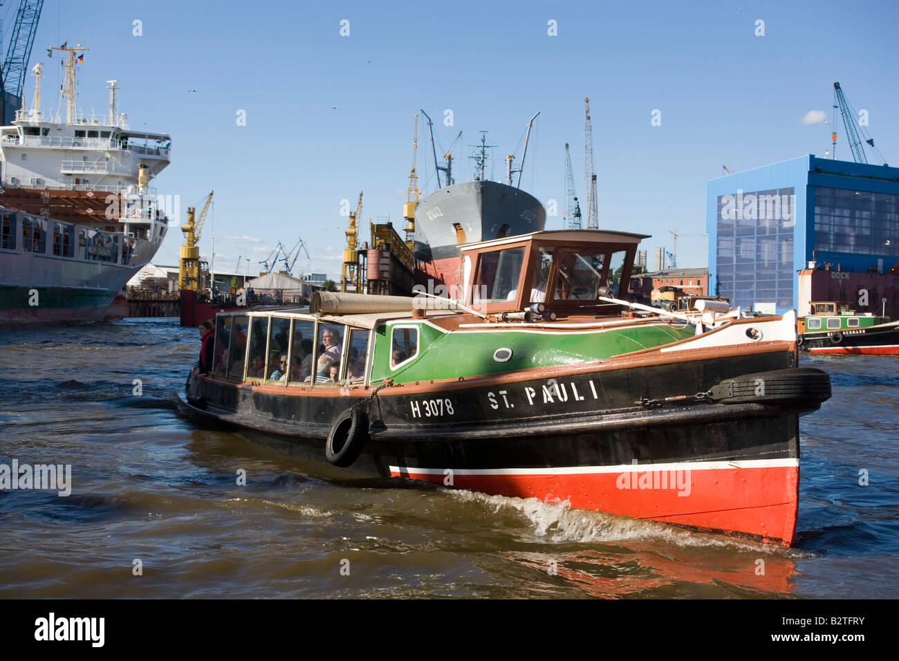 Harbour tour with a barge, People having a harbour tour with a barge at ...