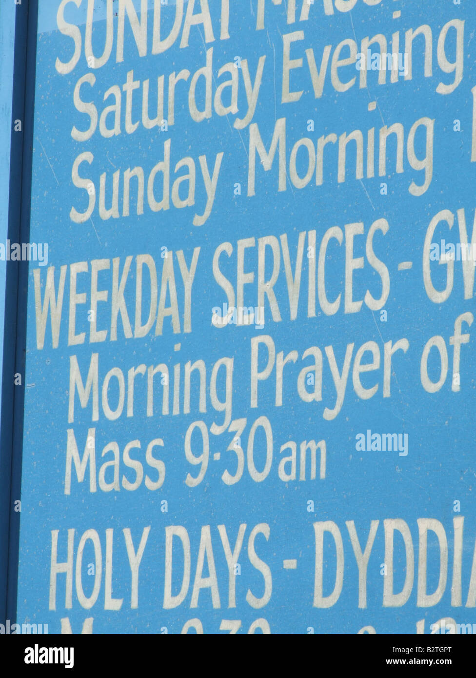 worship times notice outside church Stock Photo - Alamy