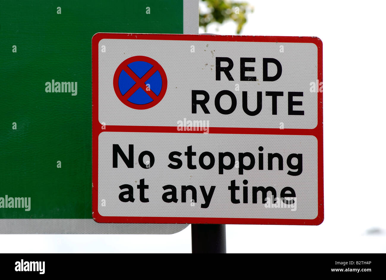 Red Route No stopping at any time sign, UK Stock Photo - Alamy