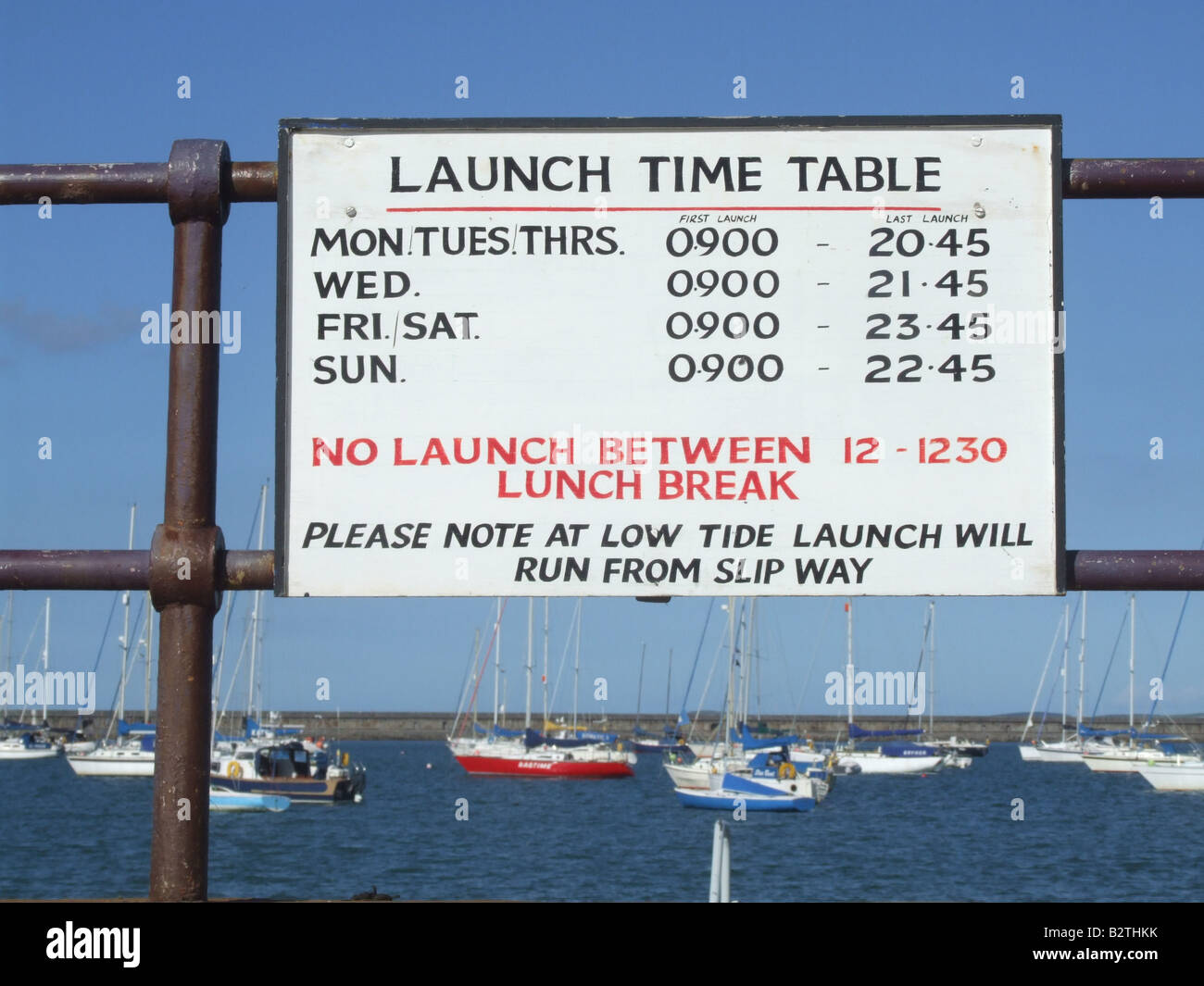 boat launch timetable at holyhead harbour, north wales Stock Photo - Alamy