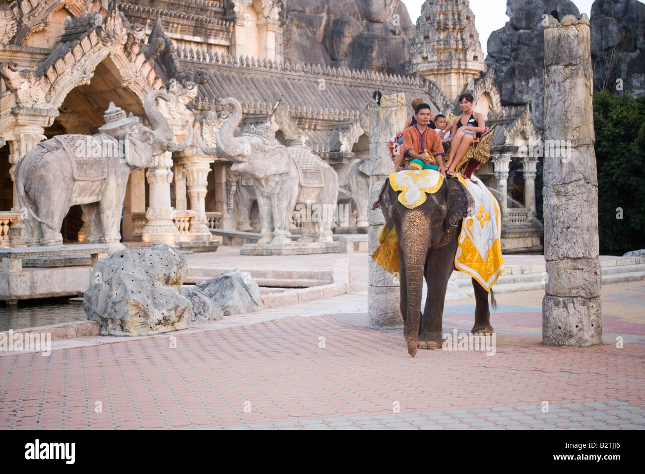 Tourists riding on a elephant, Palace of the Elephants, Phuket Fantasea ...