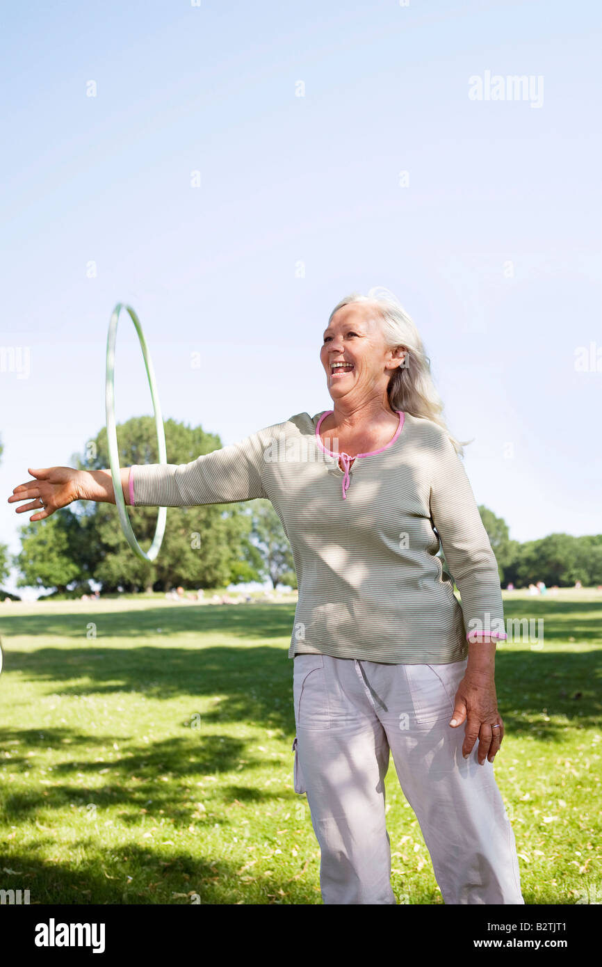 Hula hoop mature woman hi-res stock photography and images - Alamy