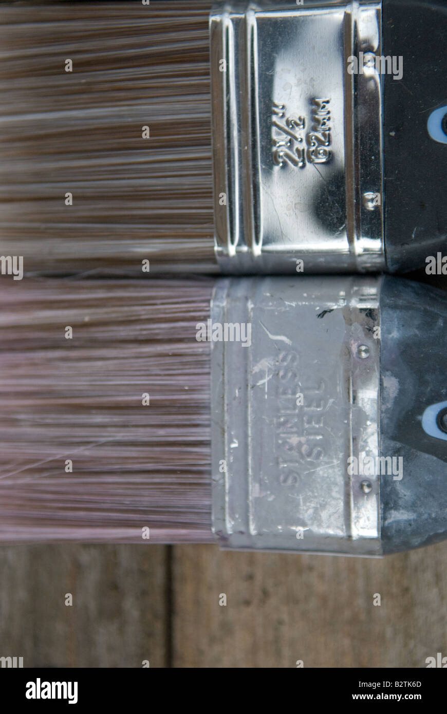 two paint brushes side by side shot from above Stock Photo - Alamy