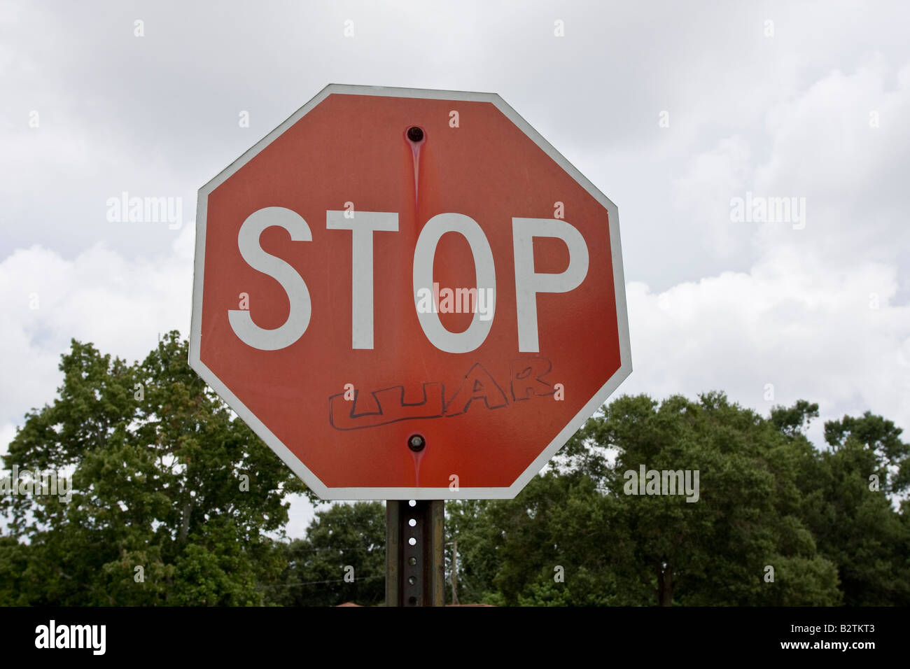 Stop sign graffiti hi-res stock photography and images - Alamy