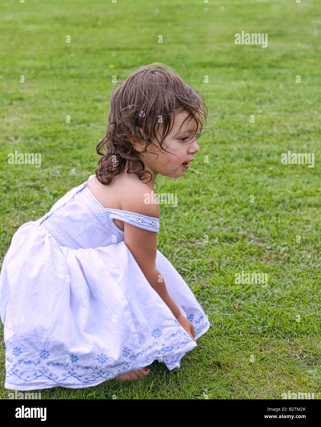Outside kneeling dress hi-res stock photography and images - Alamy