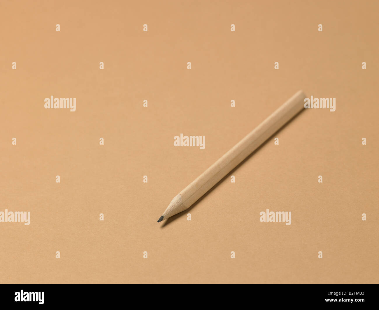 wooden pencil on beige background Stock Photo - Alamy