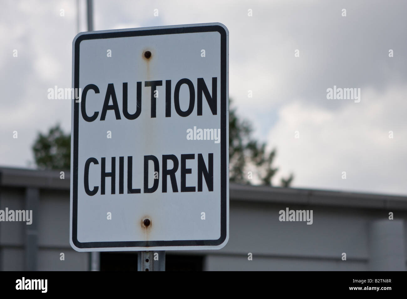 Caution Children Traffic Control Sign Stock Photo - Alamy