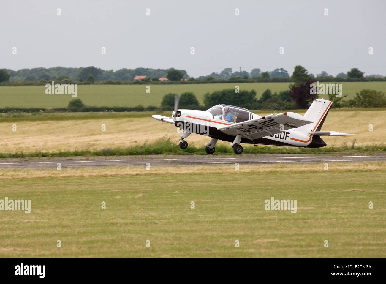 Morane Saulnier MS.880B Rallye Club G-BJDF taking-off from Wickenby ...