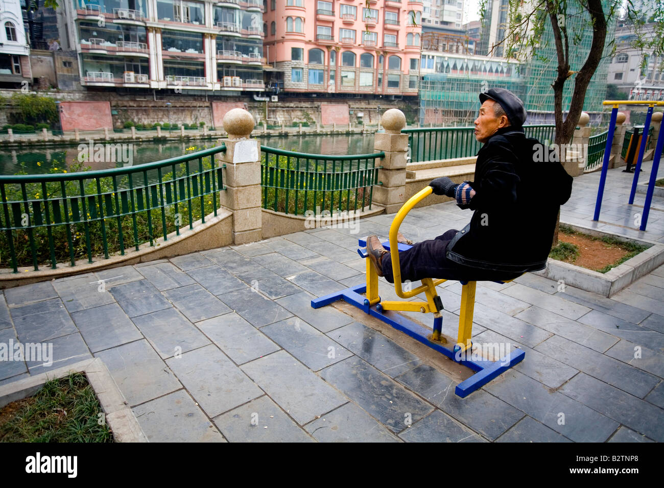 Chinese man doing exercise Stock Photo - Alamy