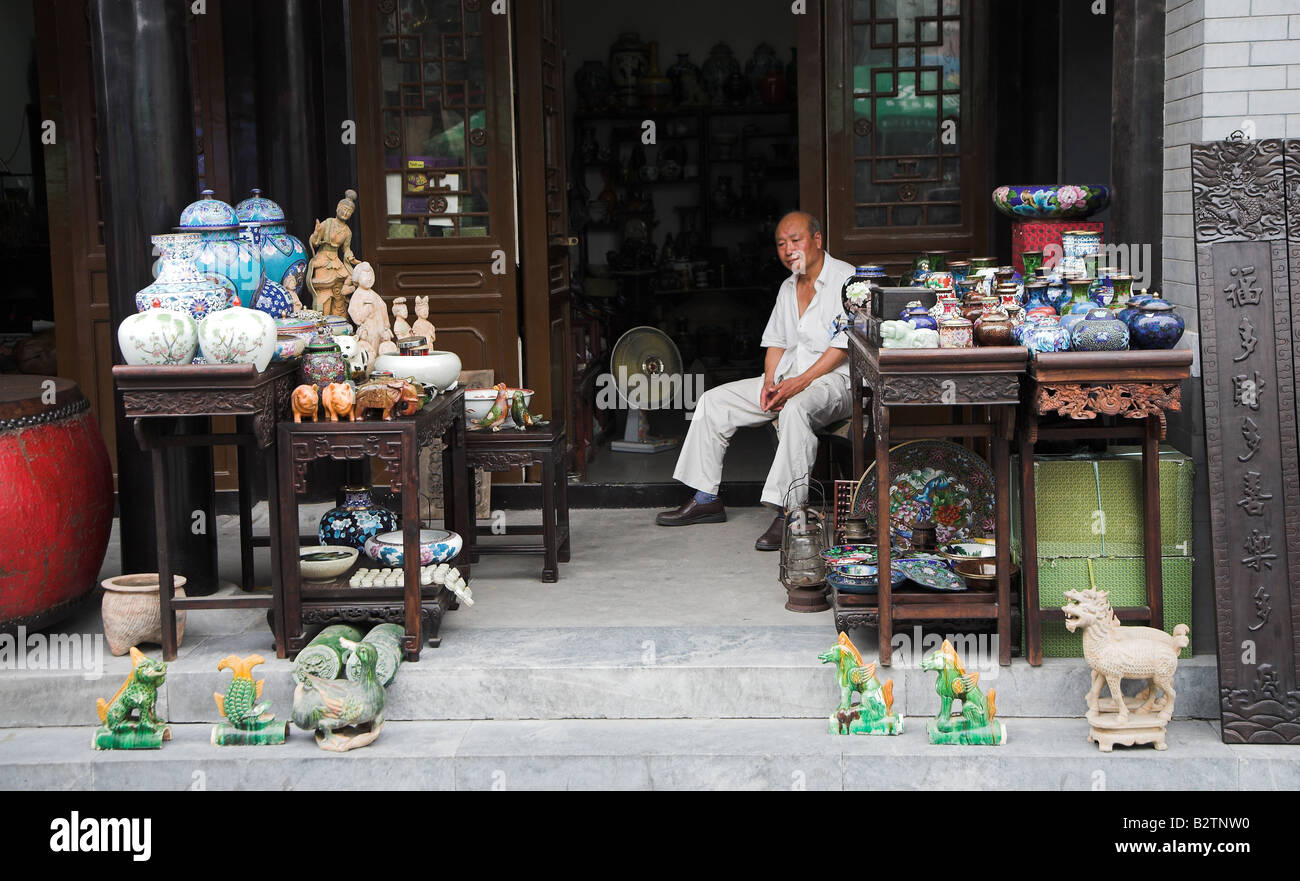 A traditional shop at the Panjiayuan antiques market in Beijing, China ...