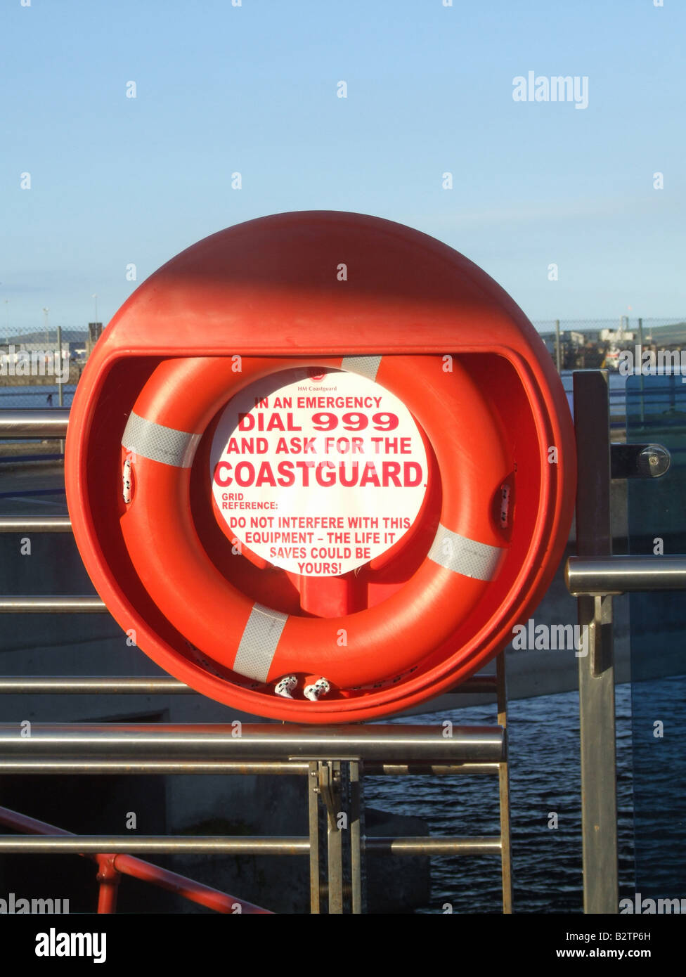 rubber ring at sos point in maritime port in uk Stock Photo - Alamy