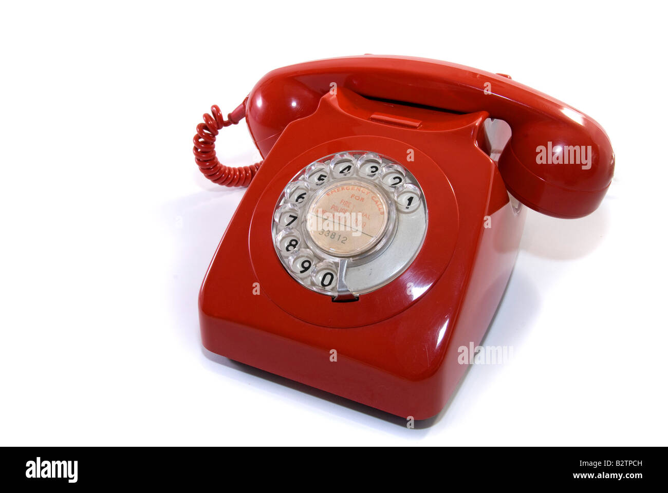 A Red retro telephone in isolation Stock Photo - Alamy