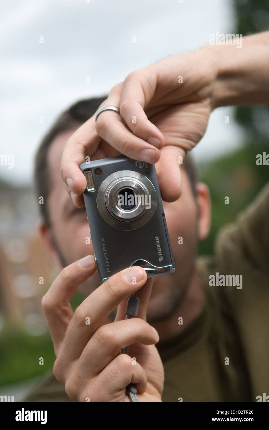 Taking a photograph Stock Photo - Alamy